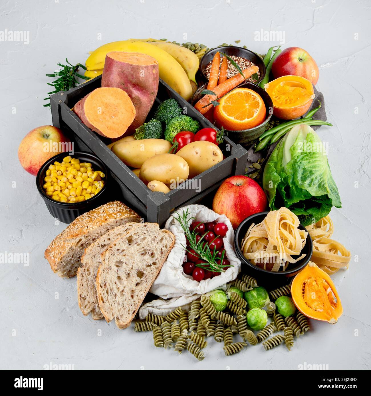 Best sources of carbs on light gray background. Healthy food concept ...