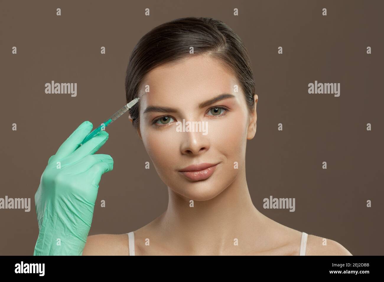 Nice woman face and syringe injection. Cosmetology and aesthetic ...