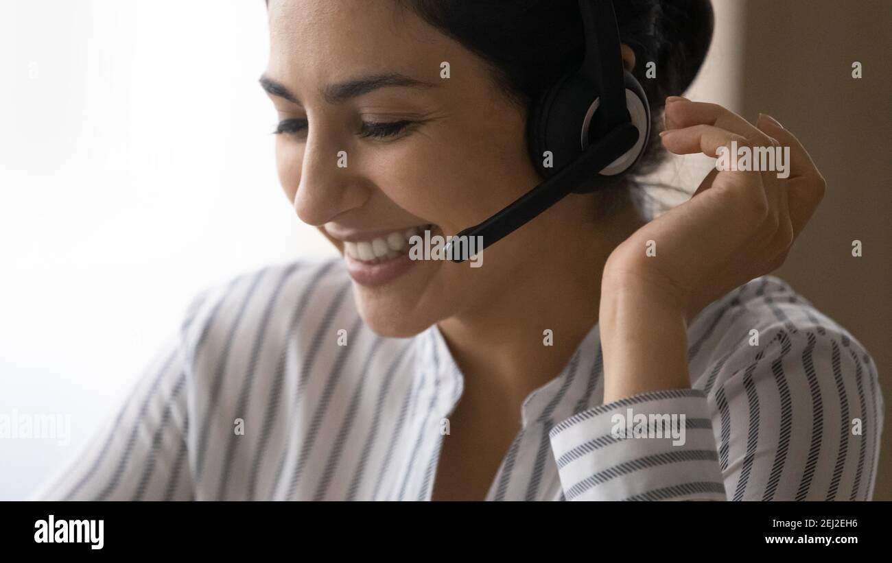 Business woman office talking earphones hi-res stock photography and ...
