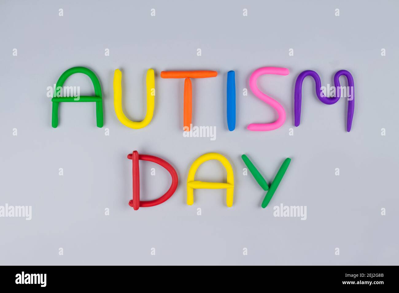 World Autism Awareness Day concept - multicolored letters made of play ...