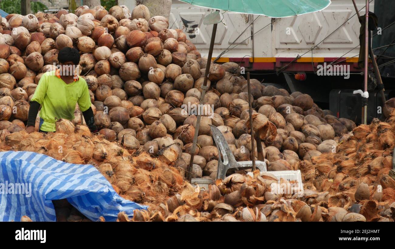 KOH SAMUI ISLAND, THAILAND - 1 JULY 2019: Asian thai men working on ...