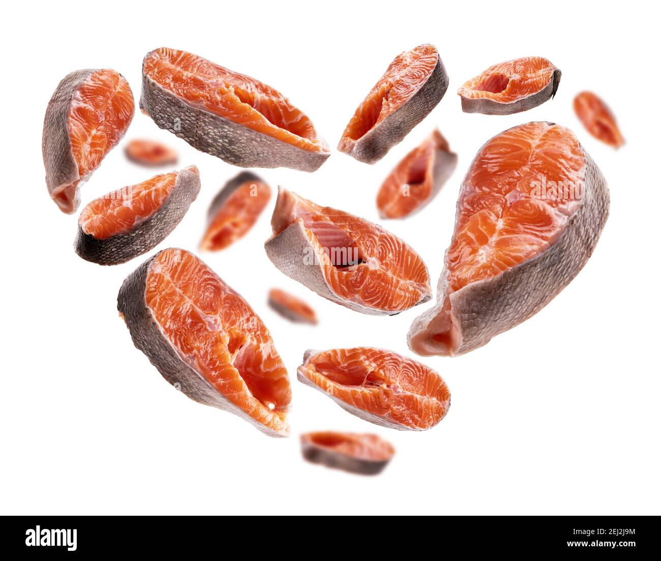 Fresh trout steaks in the shape of a heart on a white background Stock ...