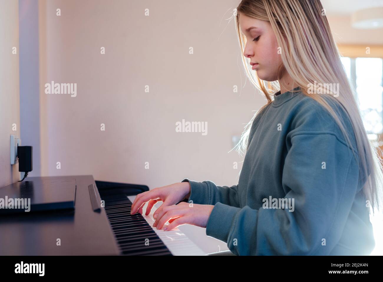 Learning play piano hi-res stock photography and images - Alamy