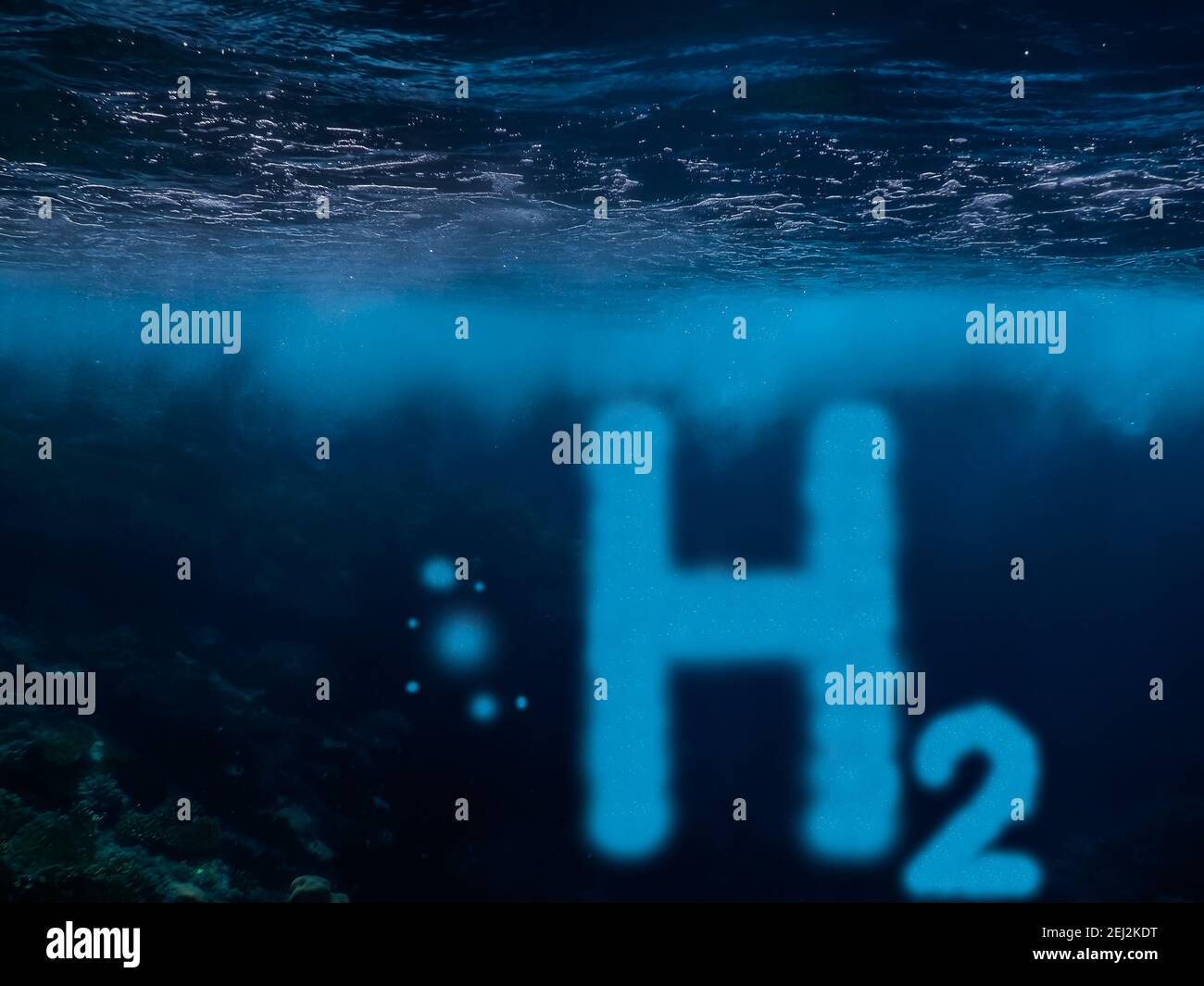 blurred hydrogen h2 letters in a water swirl from the wind in blue sea ...
