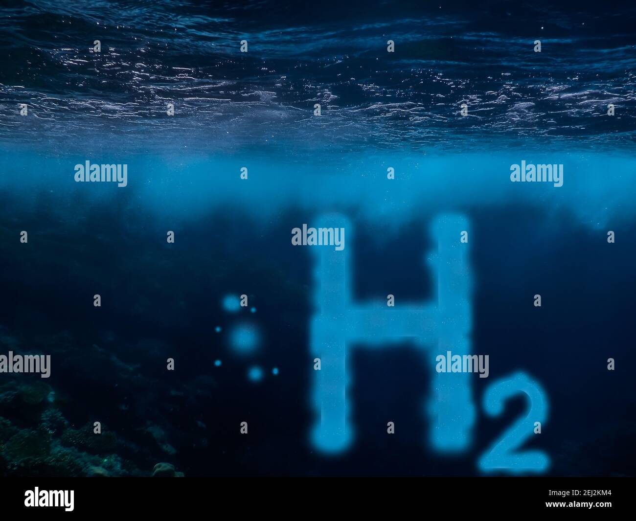 hydrogen h2 letters in a water swirl from the wind in blue sea water ...