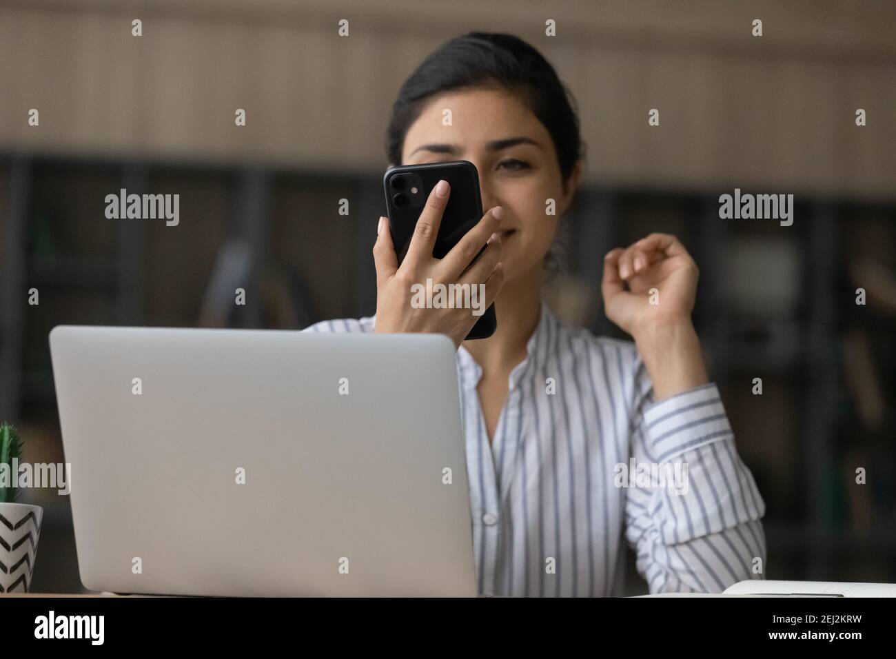Millennial Indian woman use modern electronic gadgets Stock Photo - Alamy