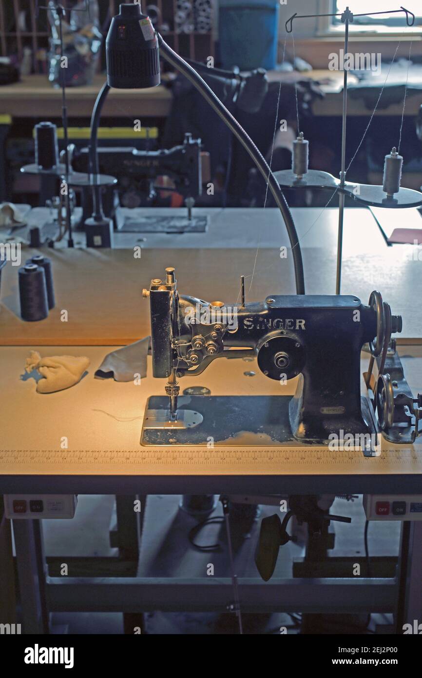Dents maker of gloves and accessories. Old Singer Sewing Machine in the ...