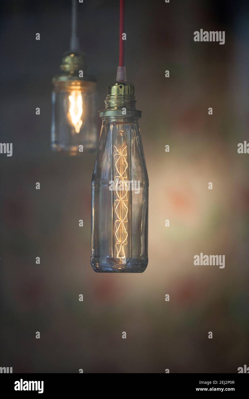 Retro style lamps hanging from the ceiling Stock Photo - Alamy