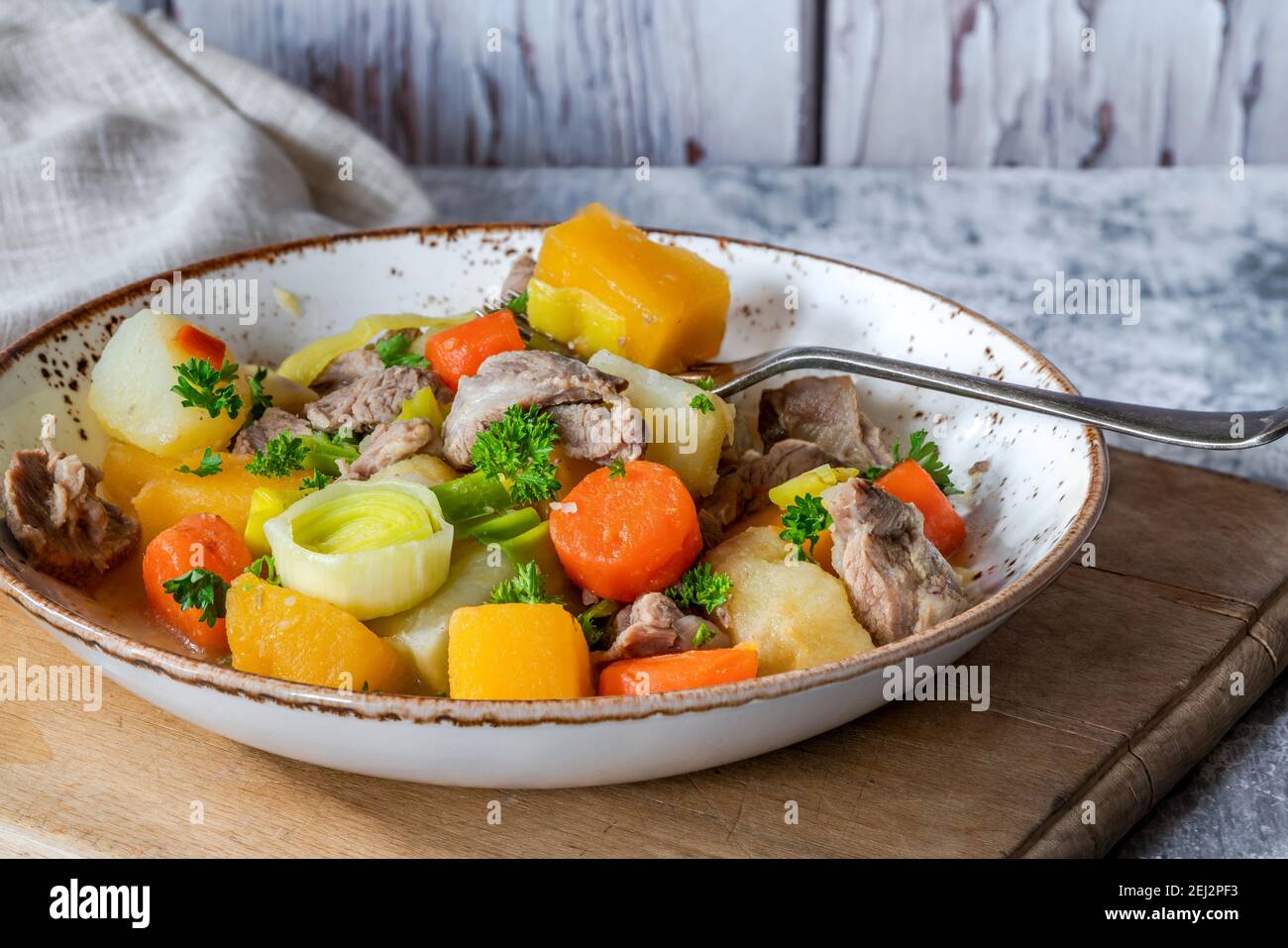 Cawl - traditional hearty Welsh stew made of lamb with leeks, potatoes ...