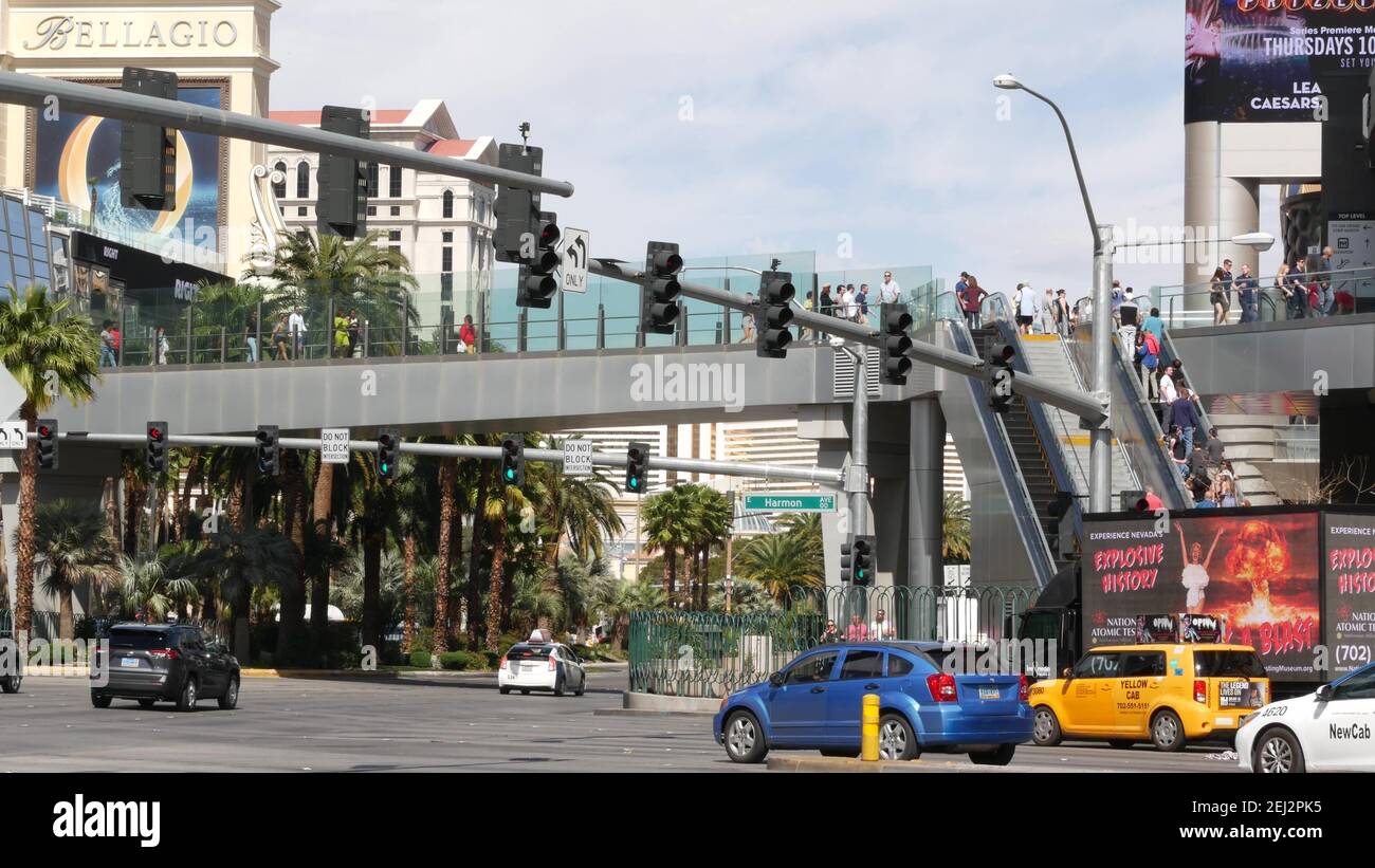 LAS VEGAS, NEVADA USA - 7 MAR 2020: People on pedestrian walkway ...