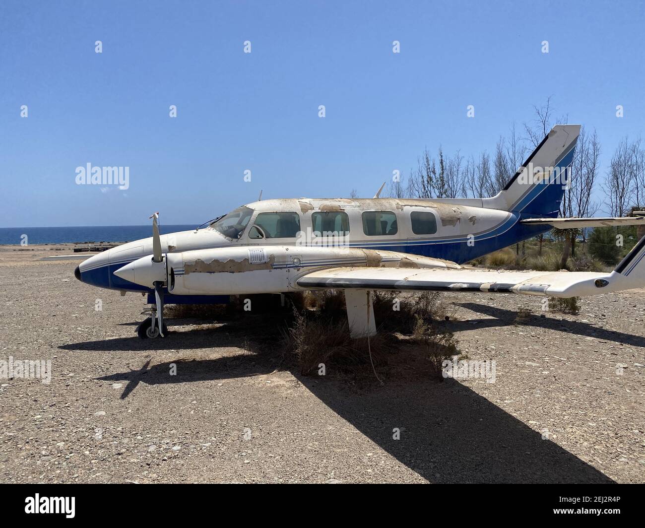 Old abandoned propeller airplane in a flying field Stock Photo - Alamy
