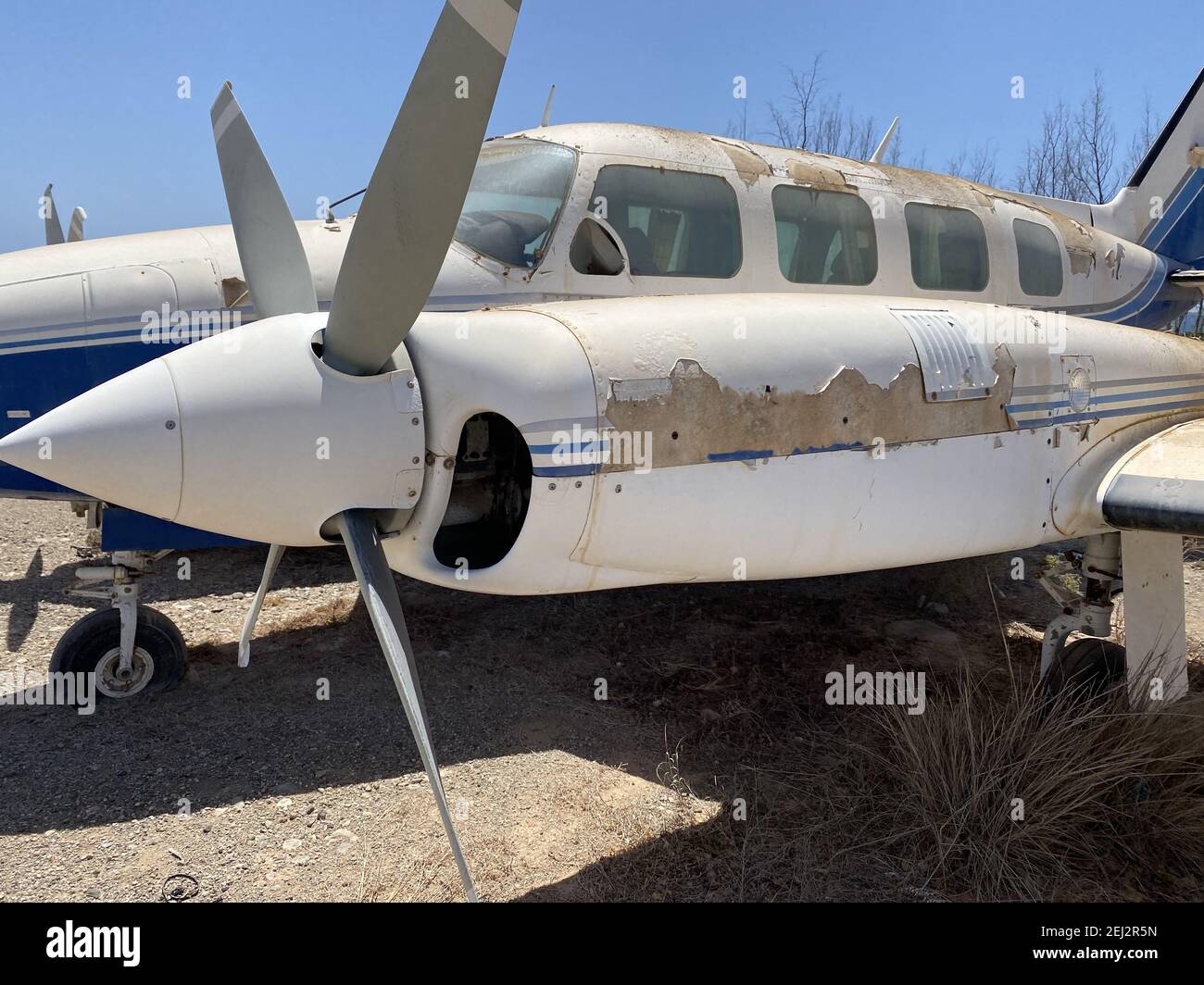 Old abandoned propeller airplane in a flying field Stock Photo - Alamy