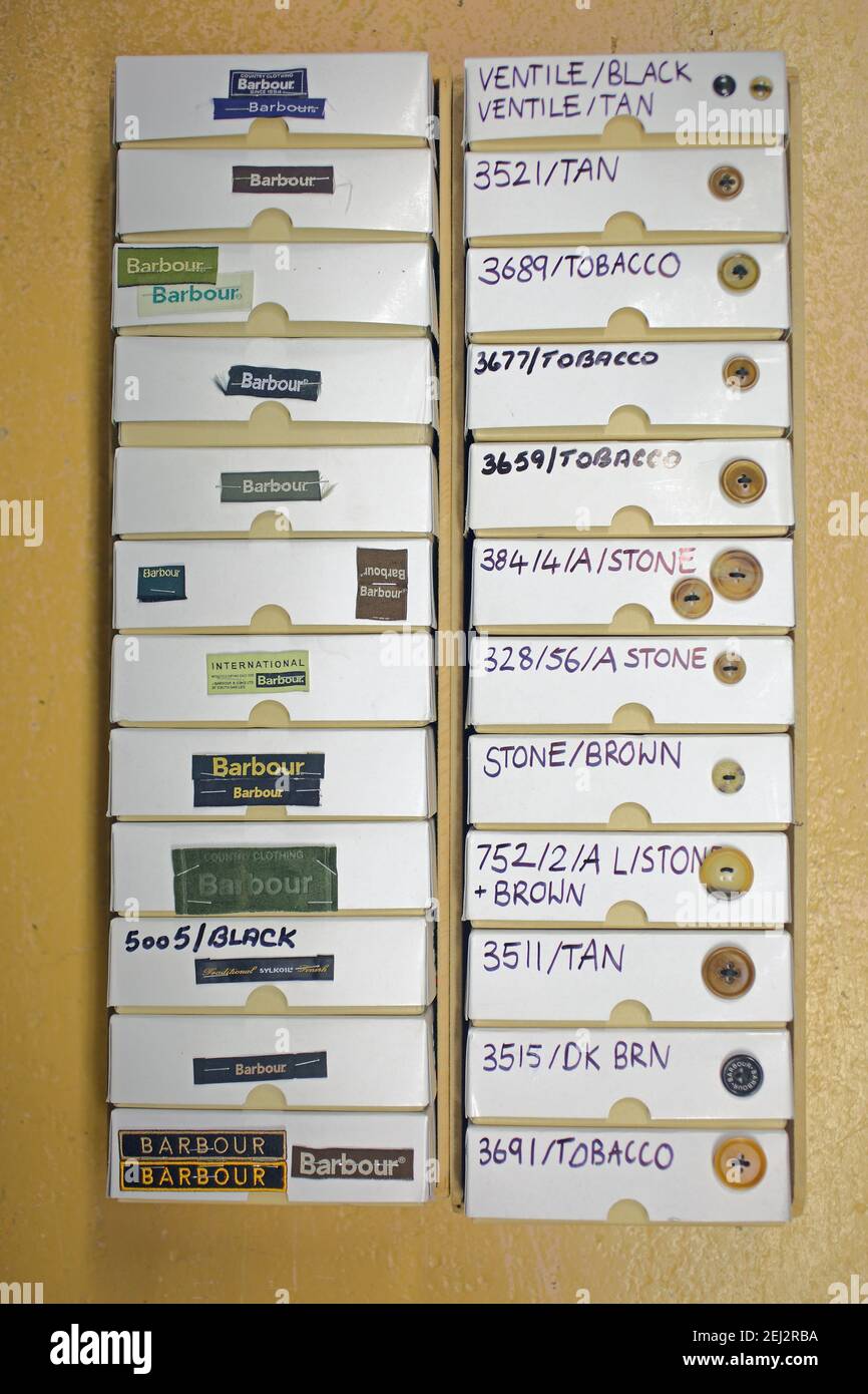 Barbour jackets label and buttons Stock Photo - Alamy