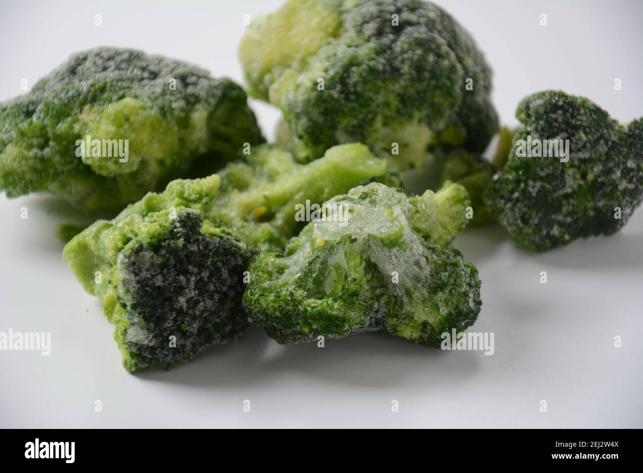 Small frozen broccoli pieces. Healthy food. Frozen vegetables Stock ...