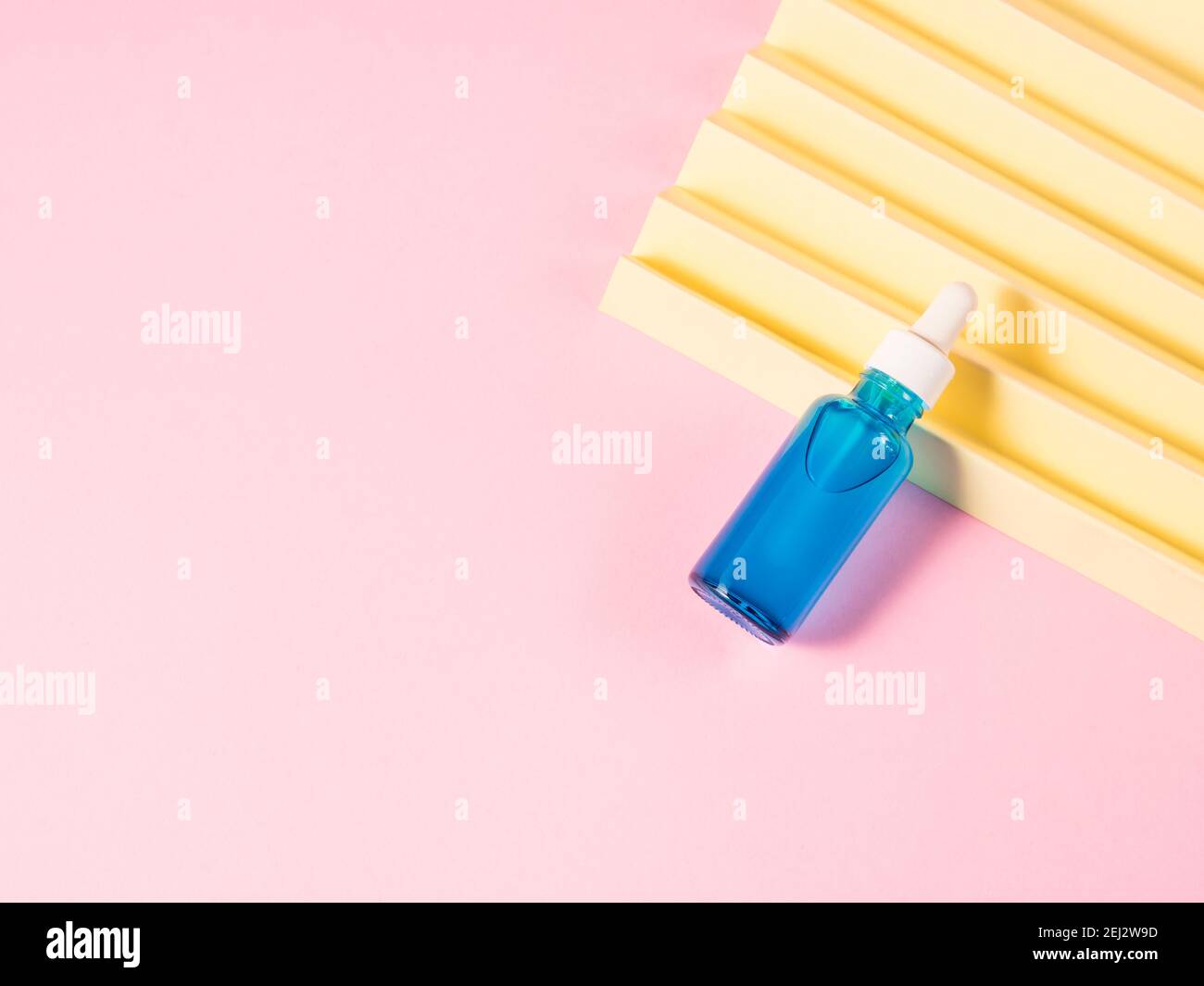 Hyaluronic acid serum generic bottle on pink geometric background Stock ...