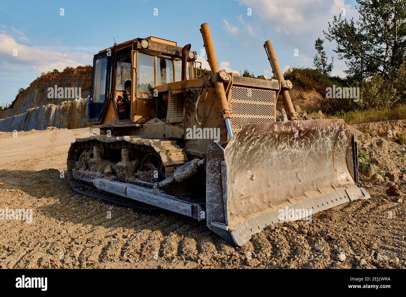 truck digging ground for construction excavator gravel sand trees blue ...