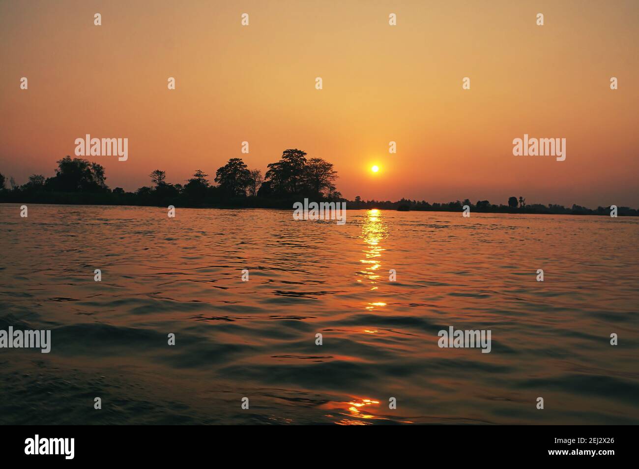 Mekong River golden sunset Stock Photo - Alamy