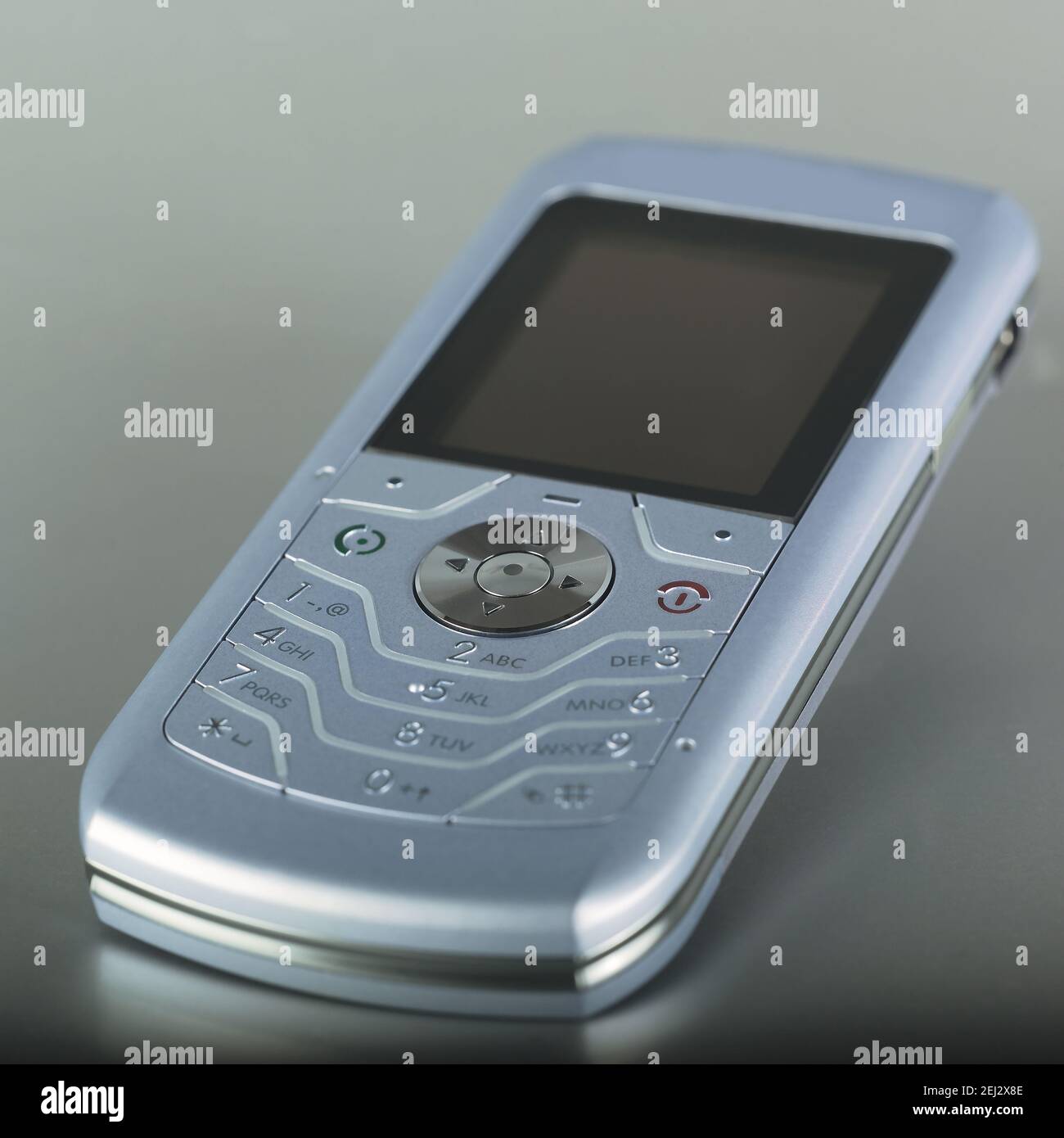 Obsolete cellphone on white background. Studio shoot Stock Photo - Alamy