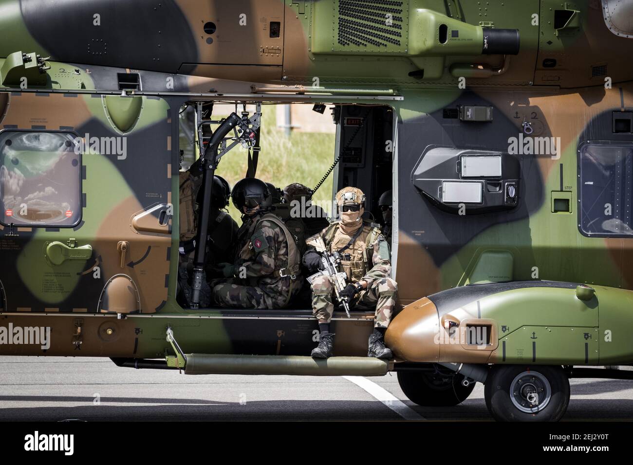 French Army NH90 transport helicopter taxiing with soldiers in the ...