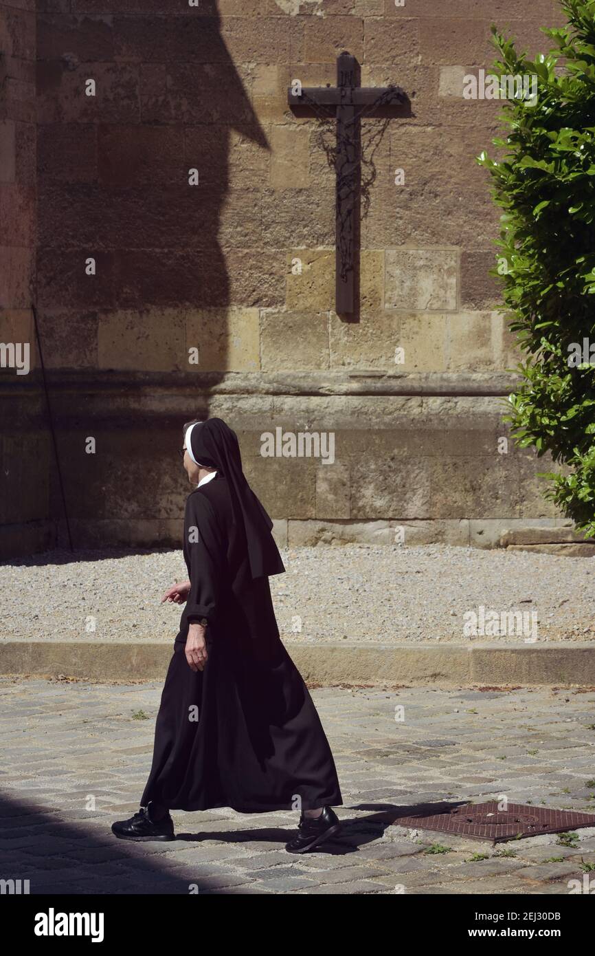 Catholic Nun Walking In Street High Resolution Stock Photography and ...