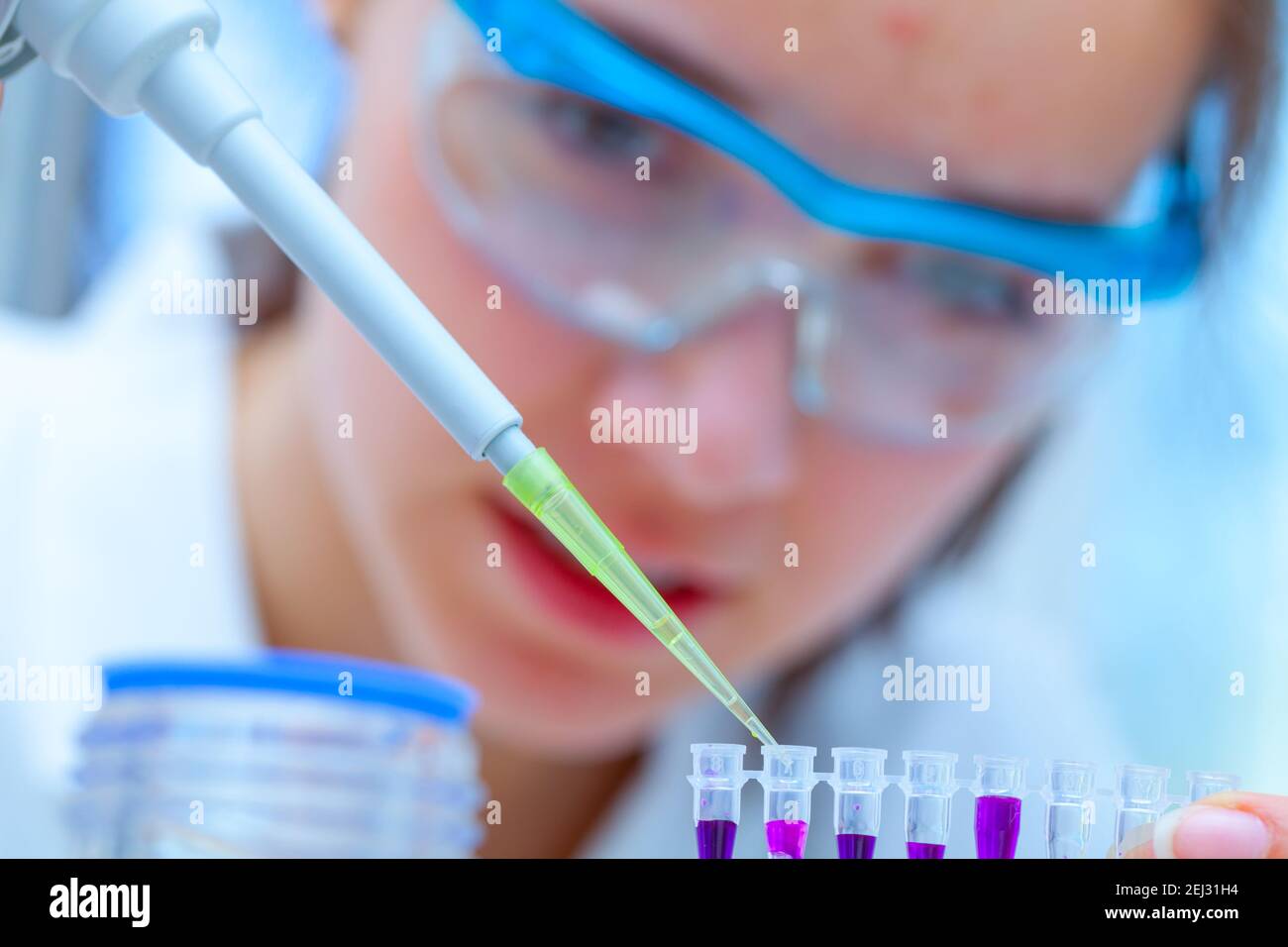Girl laboratory Assistant works with an antiviral drug in a ...