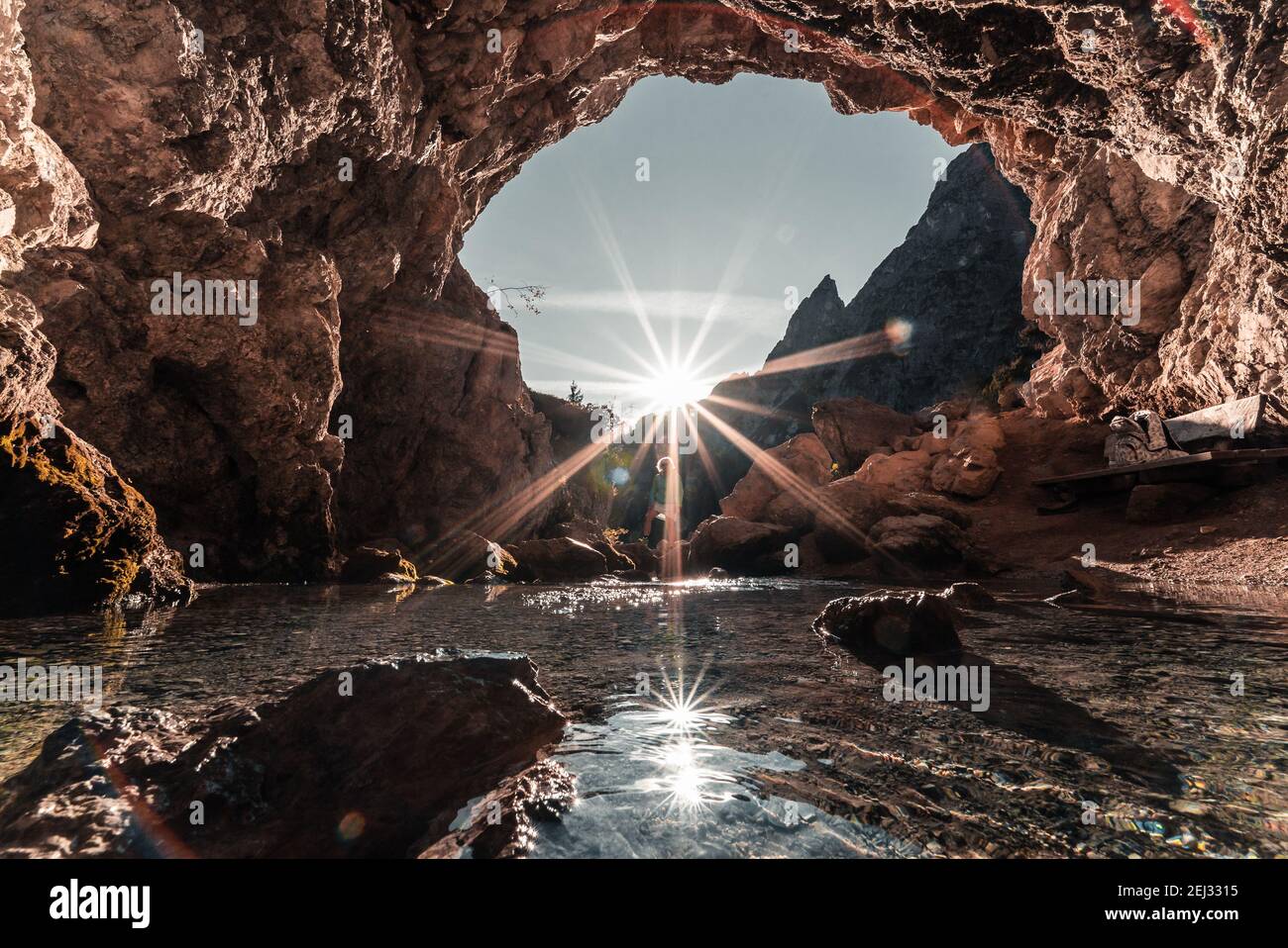 View out of a cave filled with water Stock Photo - Alamy
