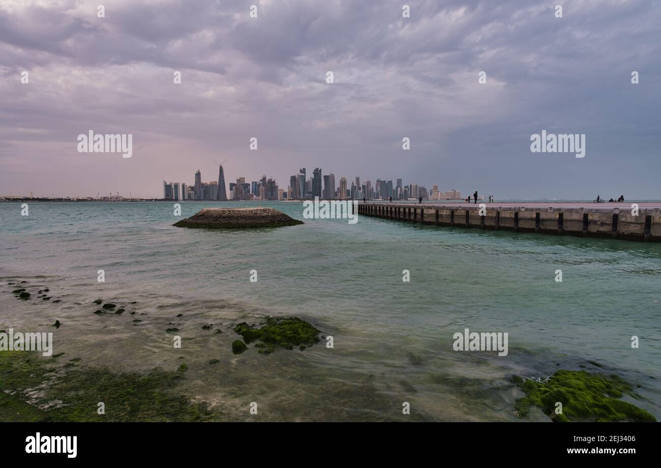 Doha skyline from the corniche promenade afternoon wide angle shot ...