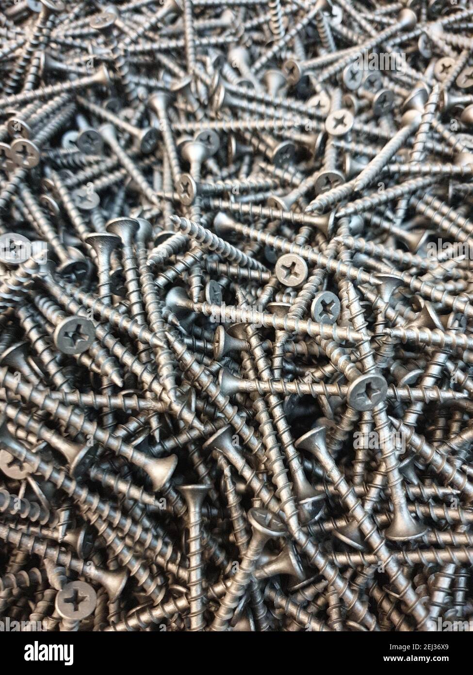 self-tapping screws on the counter of a hardware store. Background of ...