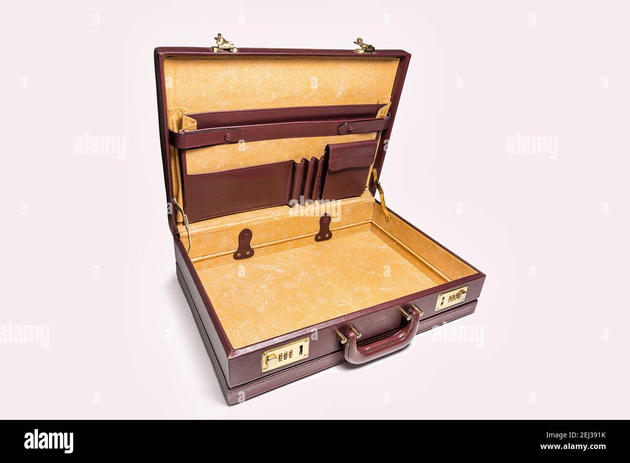 Open and empty 24 hour briefcase on white background Stock Photo - Alamy