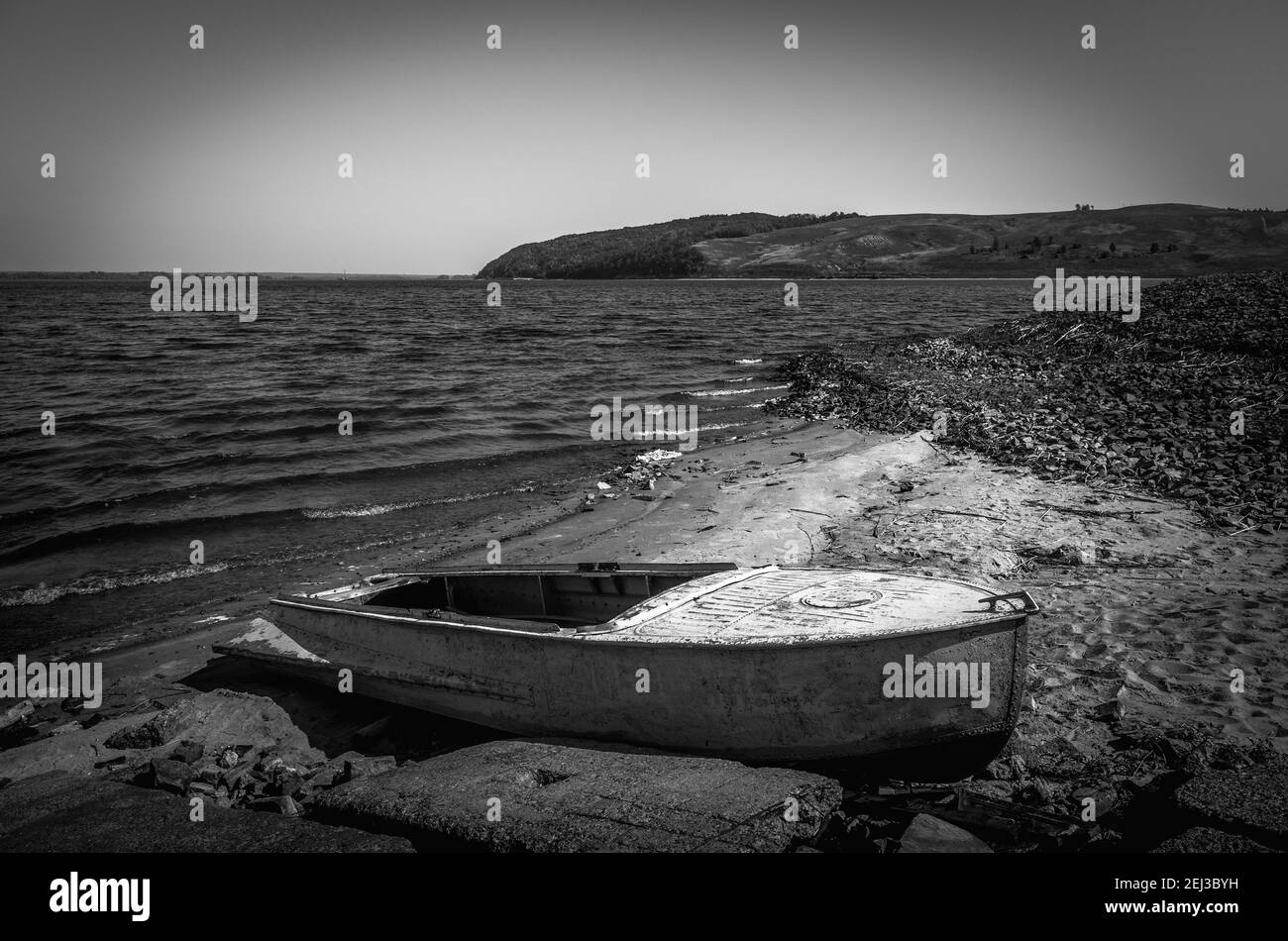 Lonely boat on the shore of Sviyazhsk, Tatarstan. Black and white Stock ...