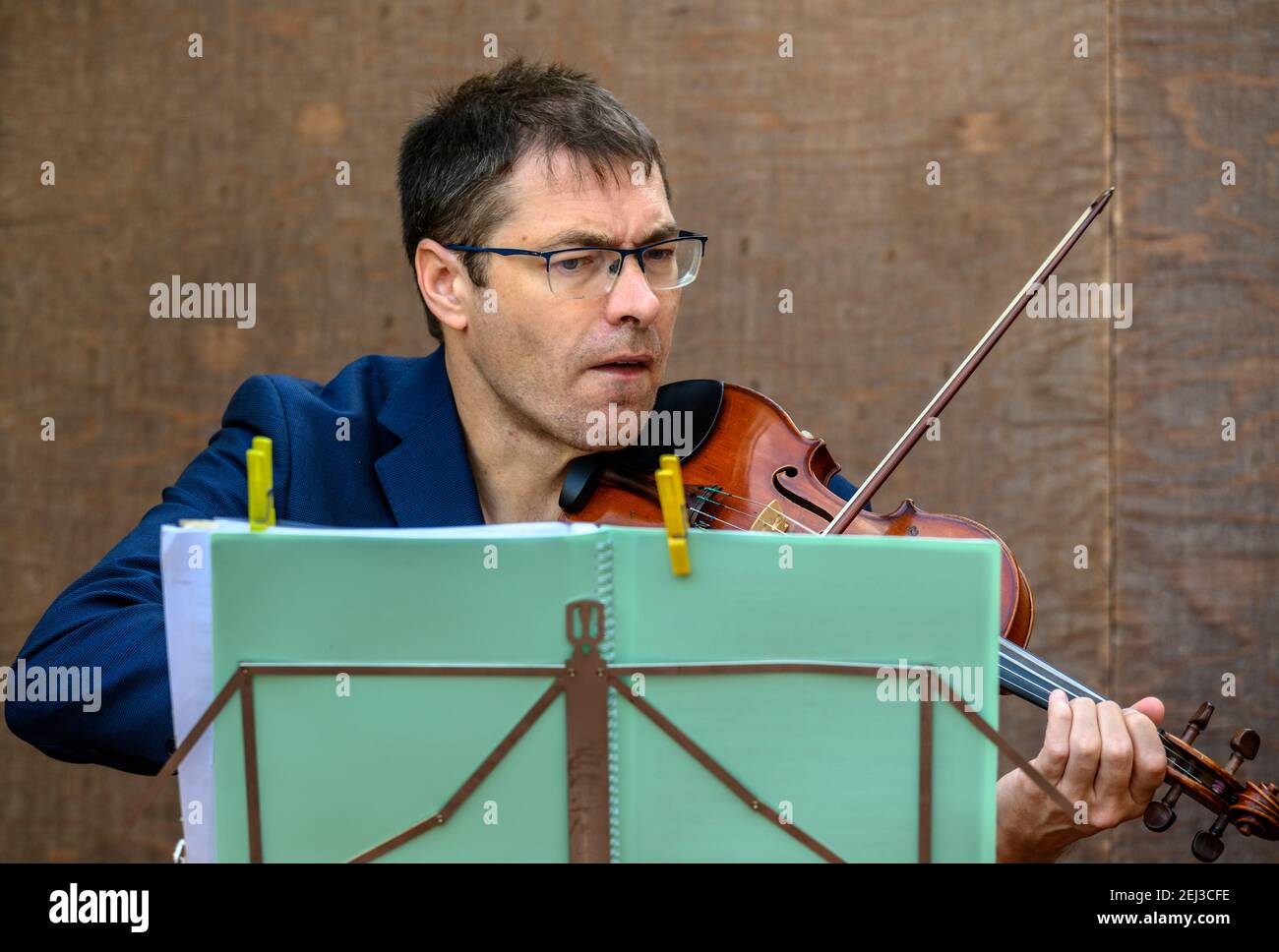 Outdoor classical recital by socially distanced trio Stock Photo - Alamy