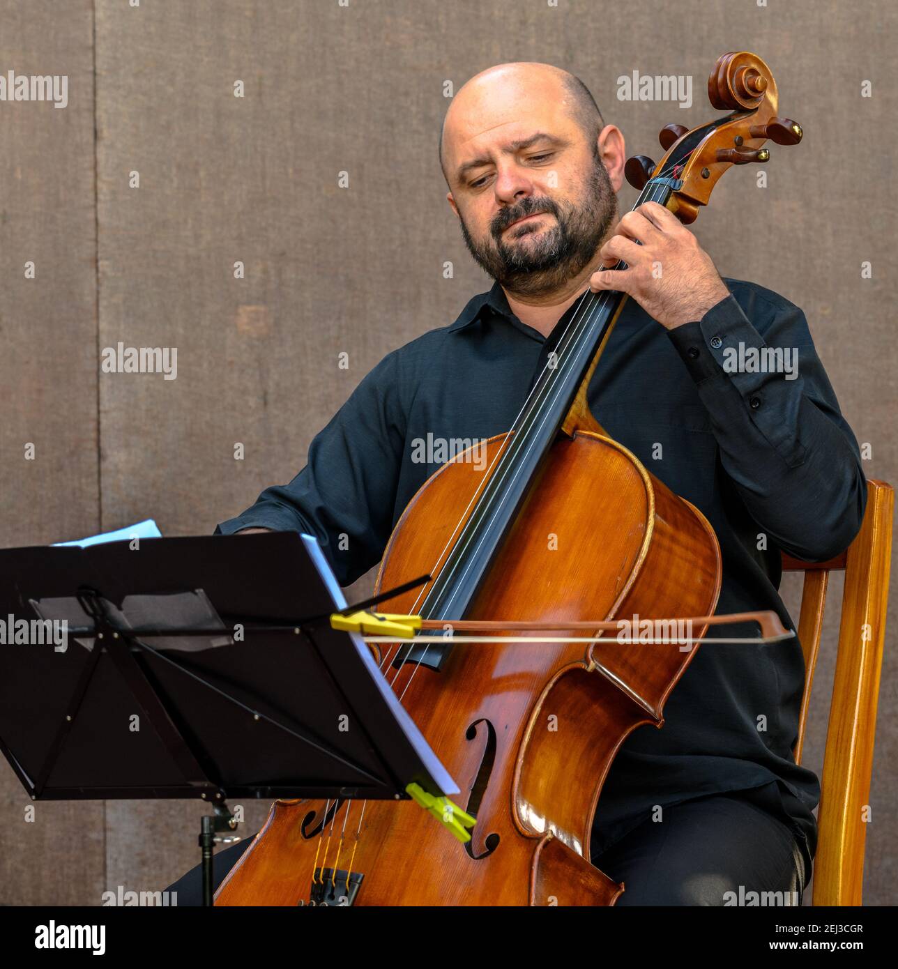 Outdoor classical recital by socially distanced trio Stock Photo - Alamy