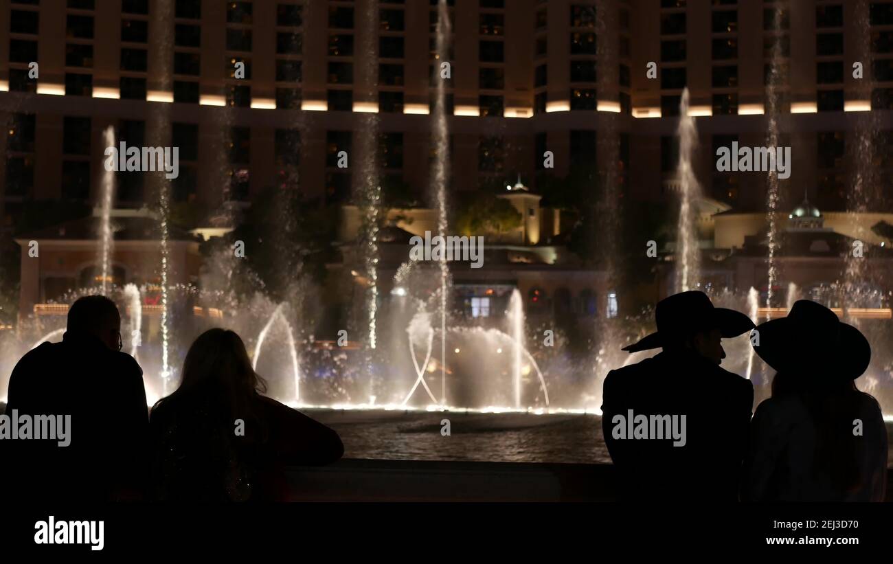 LAS VEGAS, NEVADA USA - 13 DEC 2019: People looking at Bellagio fountain musical performance at ...