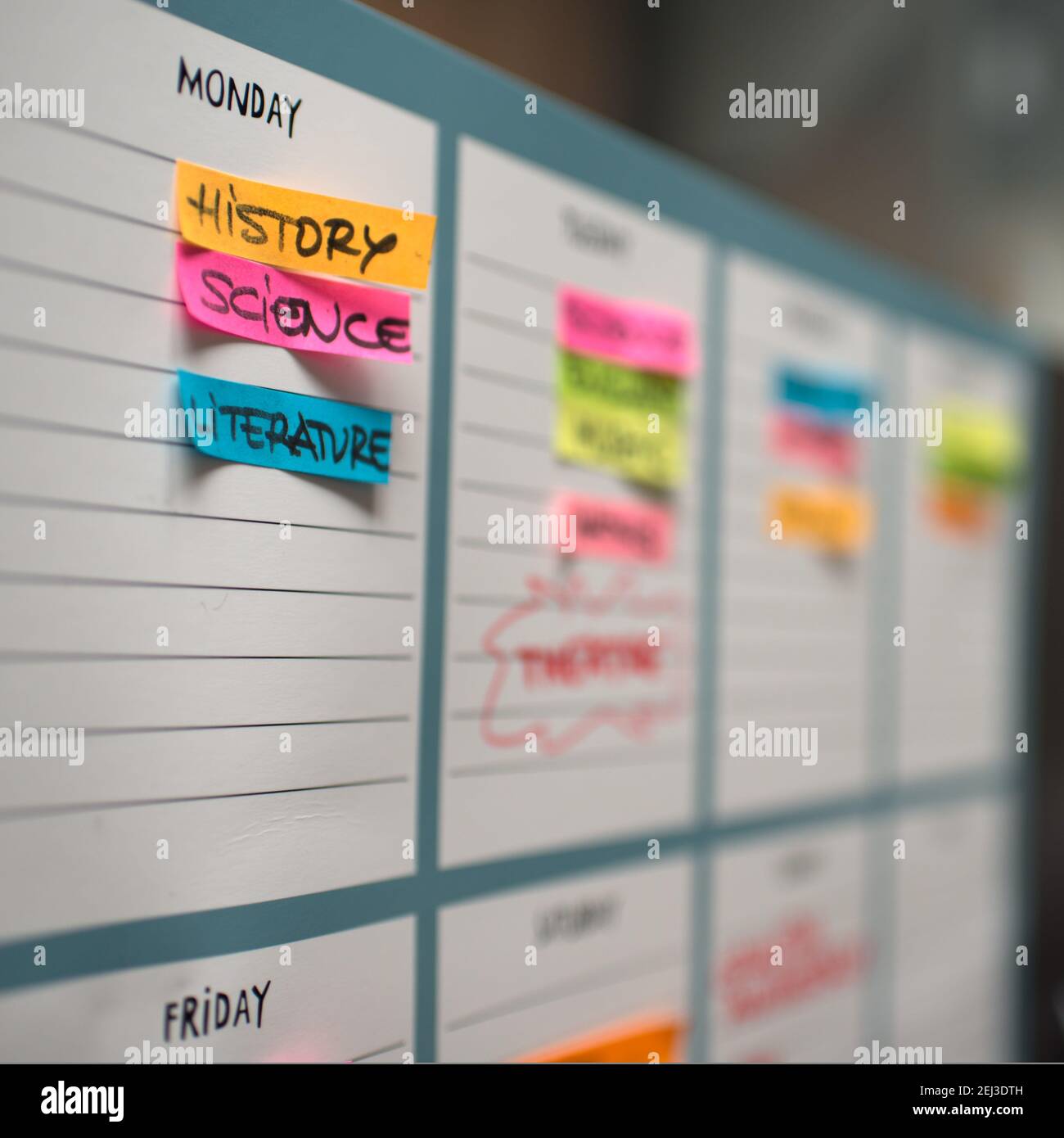 Weekly scholar timetable with colorful handwritten post it. On Monday ...