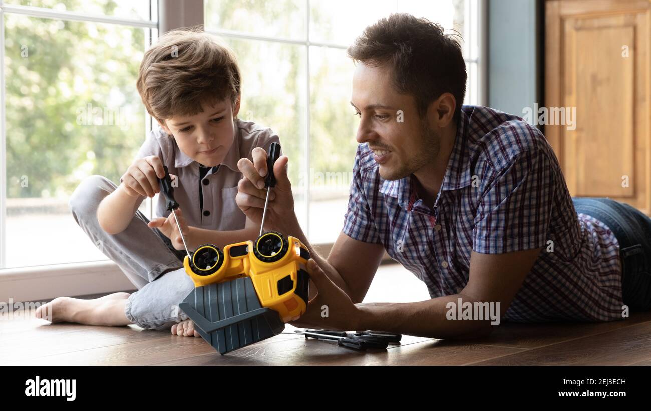 Father son car repair hi-res stock photography and images - Alamy