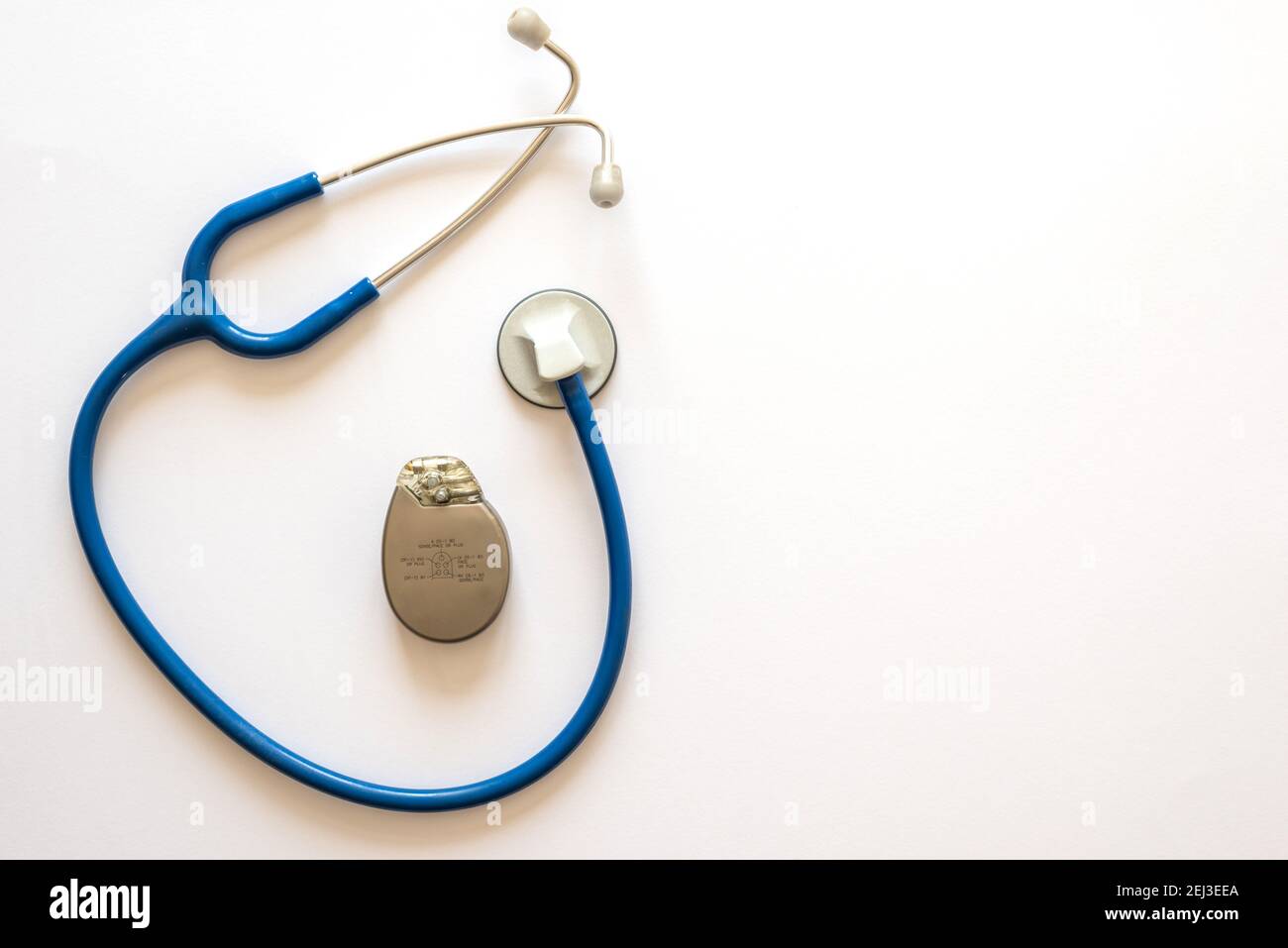 BLUE PHONE STEM WITH PACEMAKER BATTERY WHITE BACKGROUND Stock Photo - Alamy