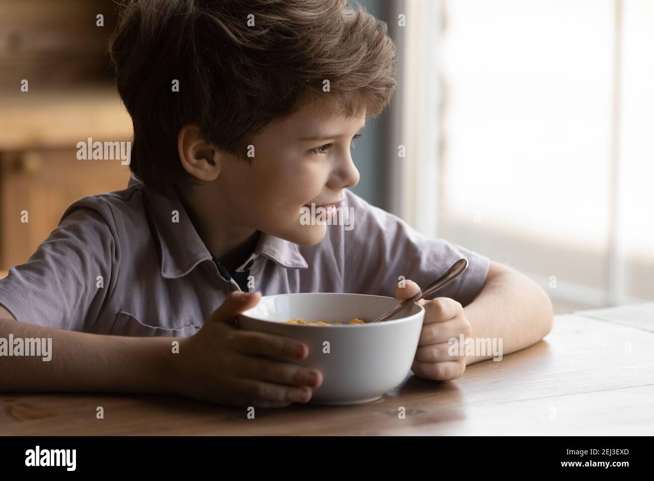 Boy Holding Bowl High Resolution Stock Photography and Images - Alamy