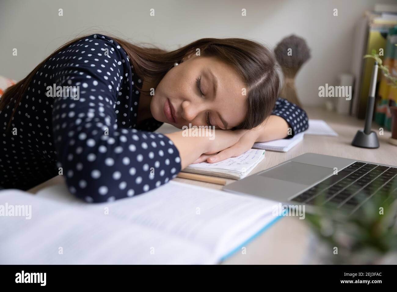 Exhausted female student fall asleep studying at home Stock Photo - Alamy