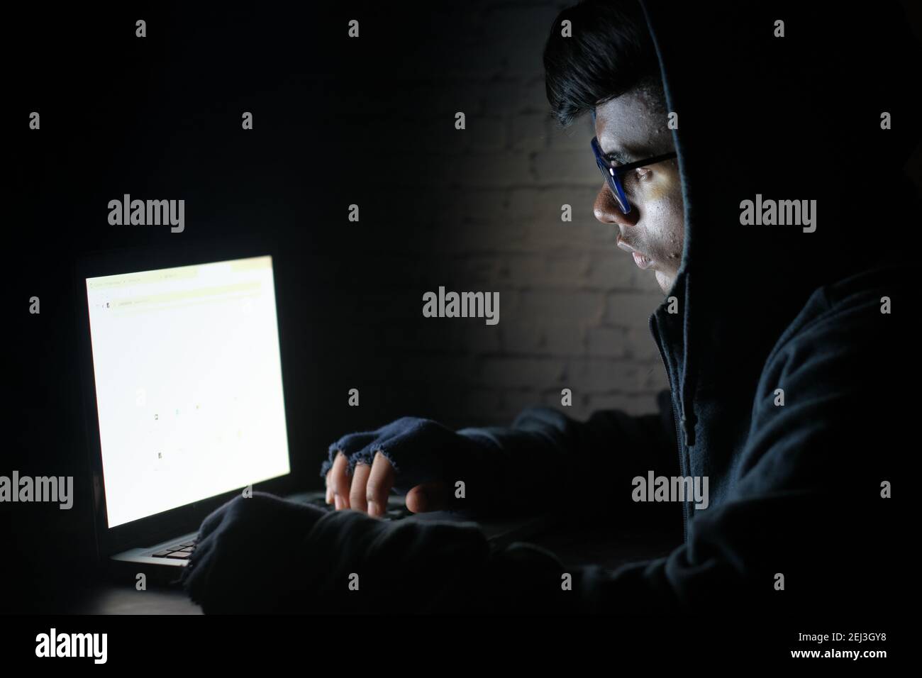hacker hand stealing data from laptop top down Stock Photo - Alamy