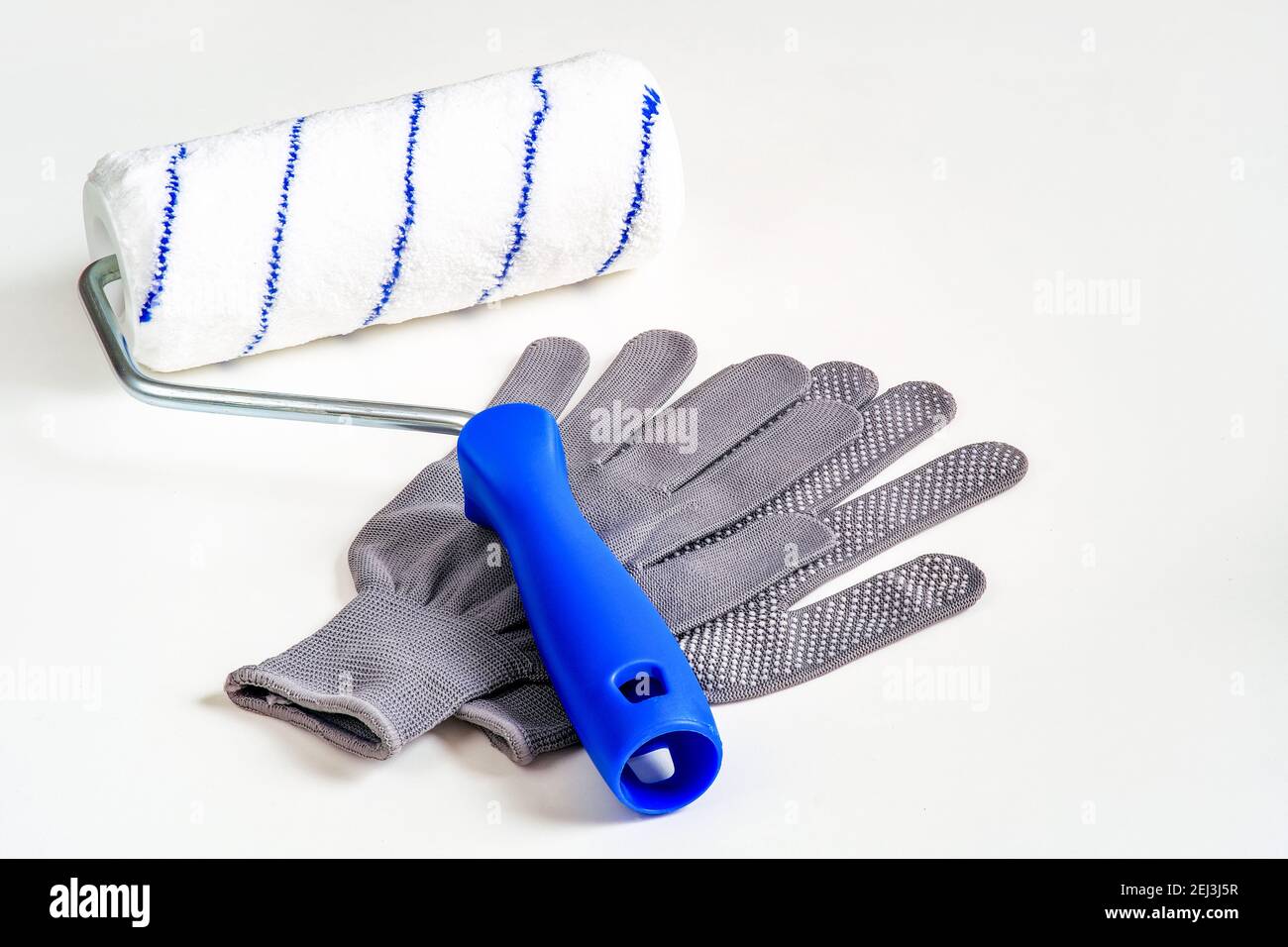 Paint roller, protective gloves, everything for repair and painting ...