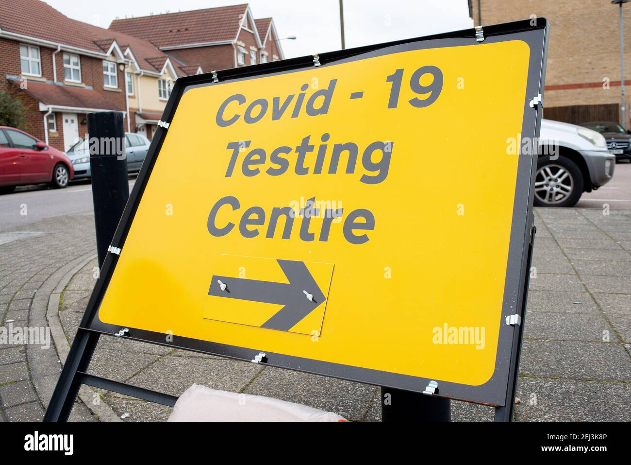 Free standing yellow road sign reading Covid-19 Testing Centre with ...
