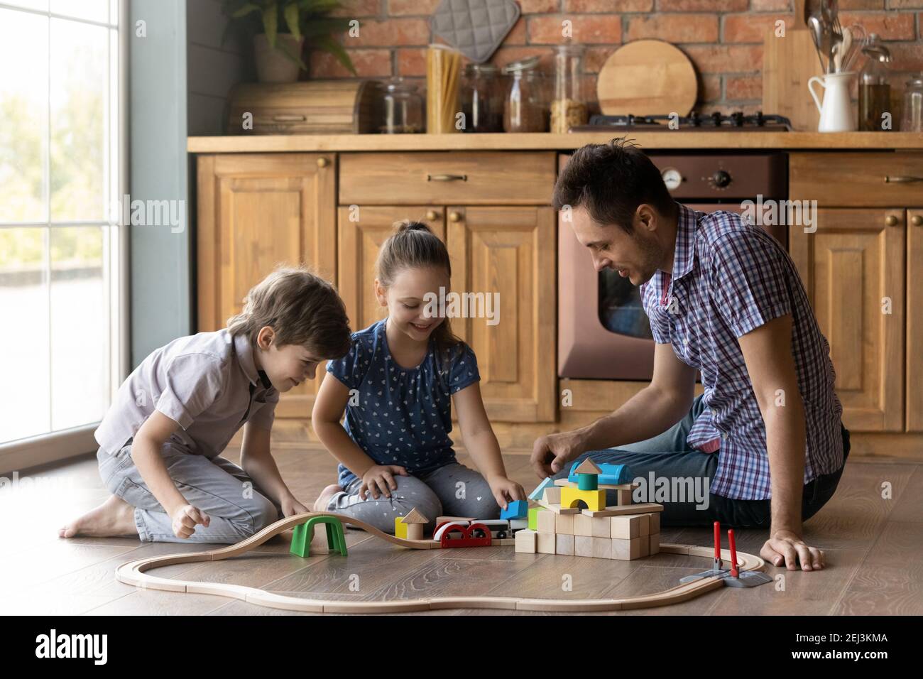 Dad playing with kids toys hi-res stock photography and images - Alamy