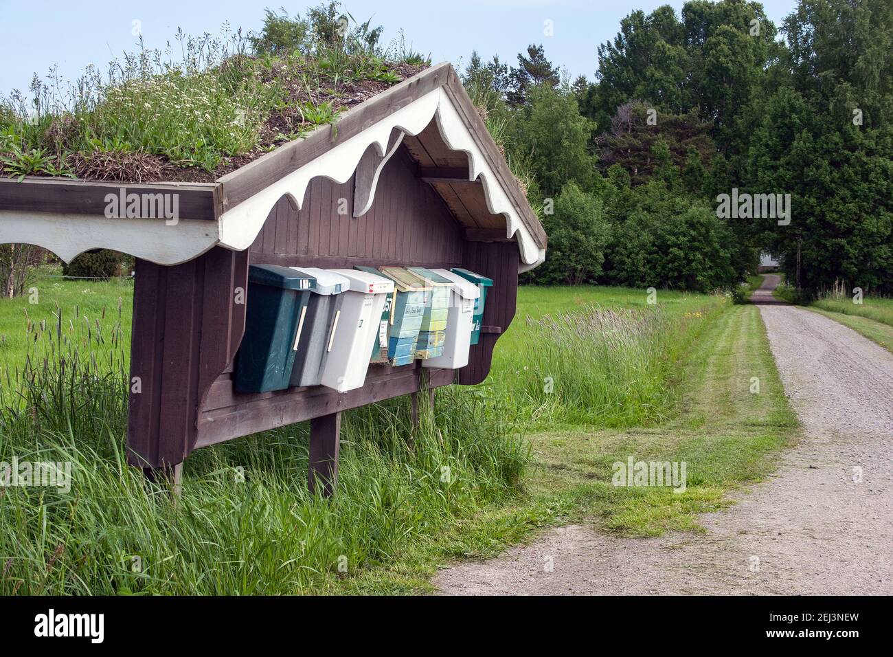 Mailboxes in a row at rural cabin site, Sweden summertime. Photo Bo ...