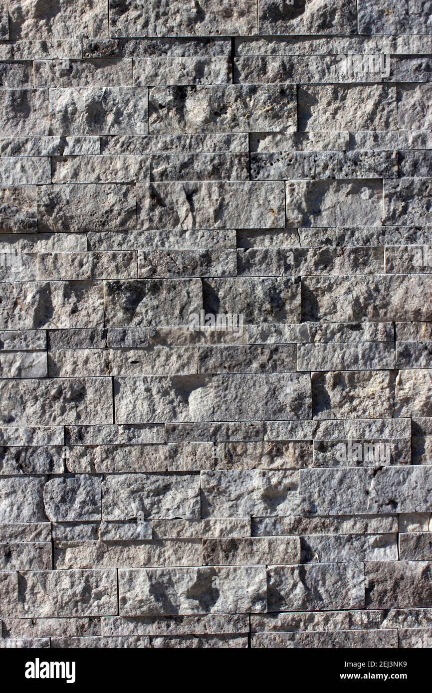 Decorative stone garden wall texture background Stock Photo - Alamy