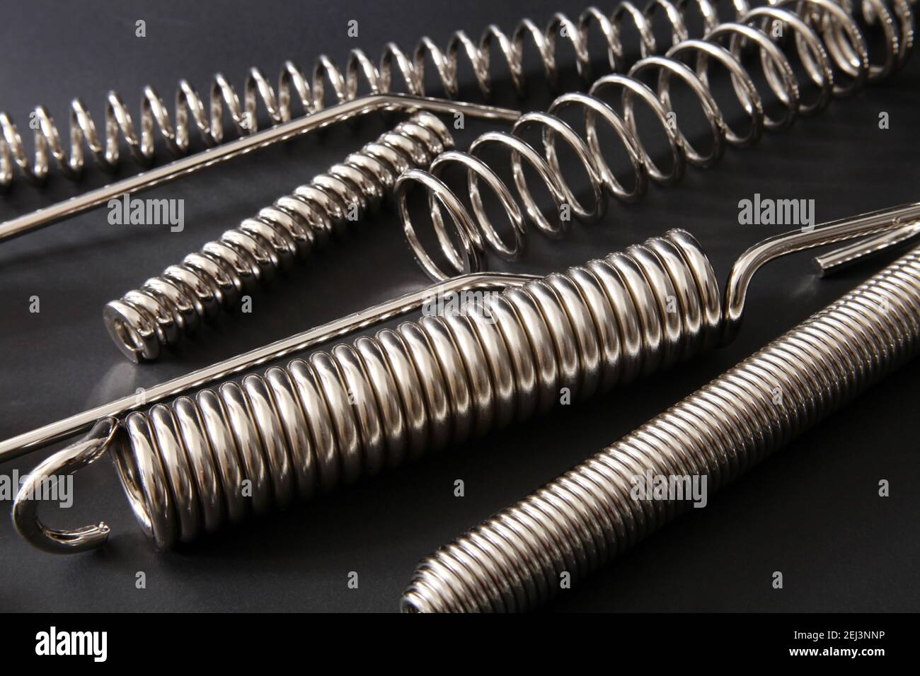 Metal springs in different sizes Stock Photo - Alamy