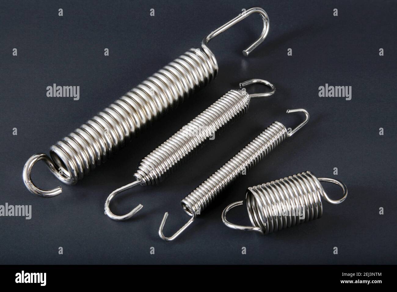 Metal springs in different sizes Stock Photo - Alamy