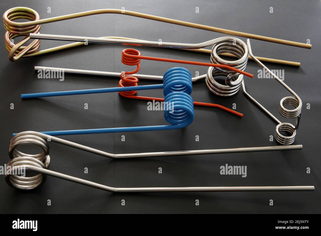 Metal springs in different sizes Stock Photo - Alamy