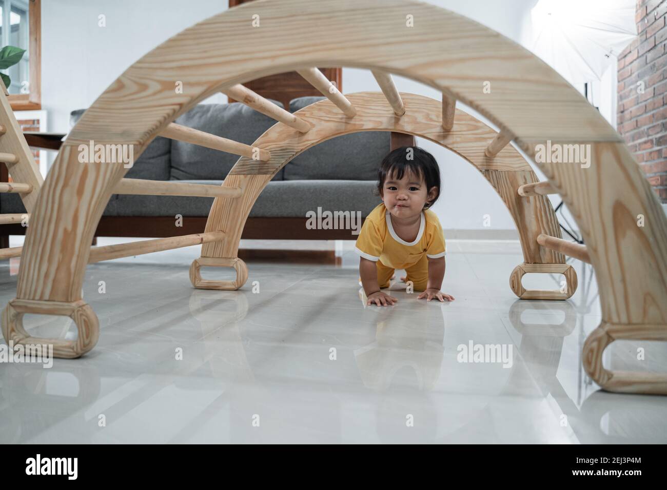 Toddler crawling playground hi-res stock photography and images - Alamy