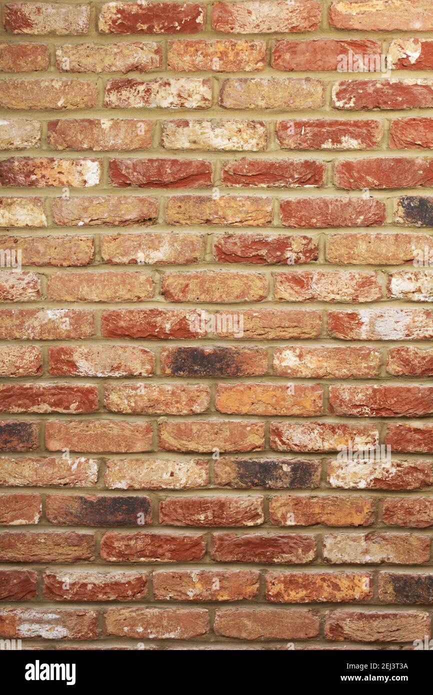Old red orange dark bricks wall background Stock Photo - Alamy