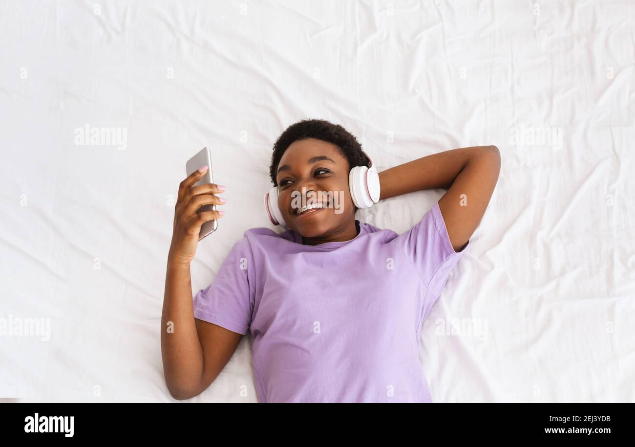 Wake up with music and emotions of joy at home alone Stock Photo - Alamy